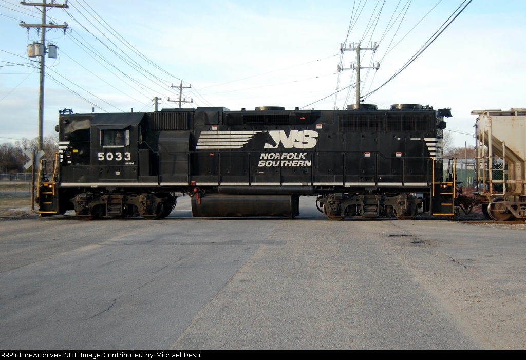 NS GP-3:-2 #5033 crosses Hercules Rd. with a couple of cars